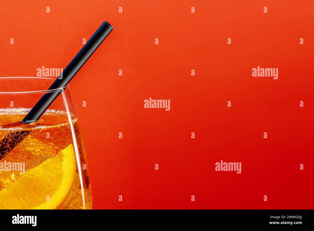 Detail Of Aperol Spritz Aperitif With Orange Slice Ice Cubes And Black