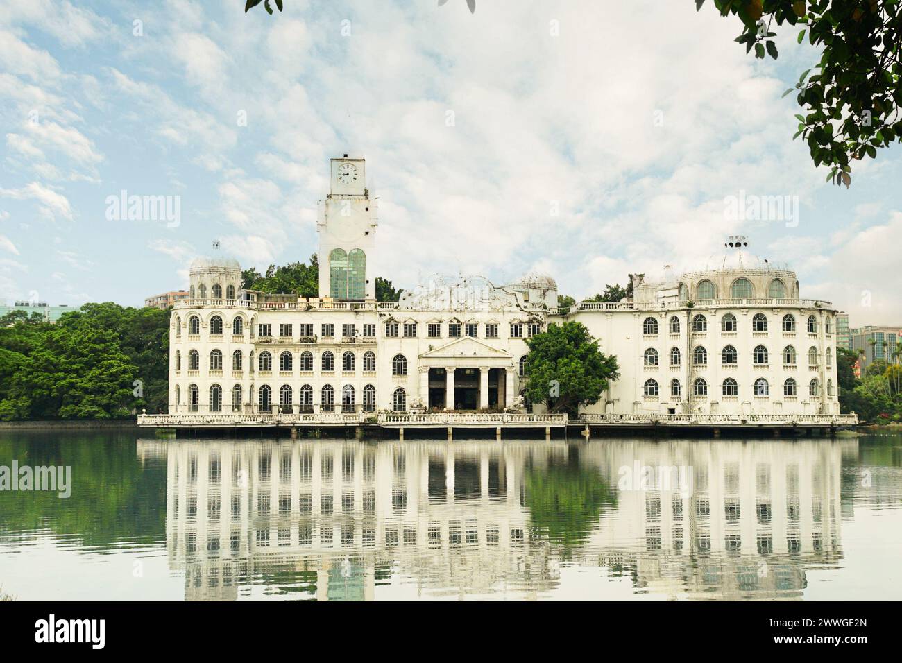 An ancient lakeside structure under a clear sky Stock Photo - Alamy