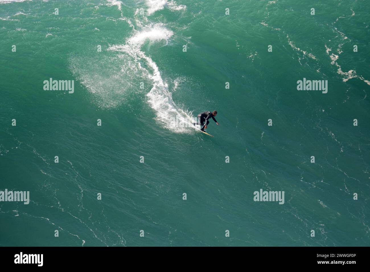 Big wave surfer hi-res stock photography and images - Alamy