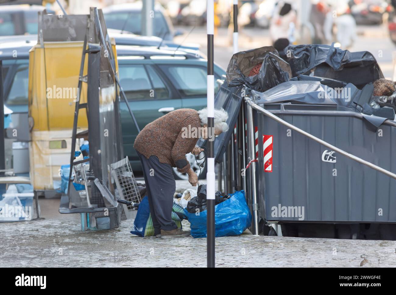Looking through trash dump hi-res stock photography and images - Alamy