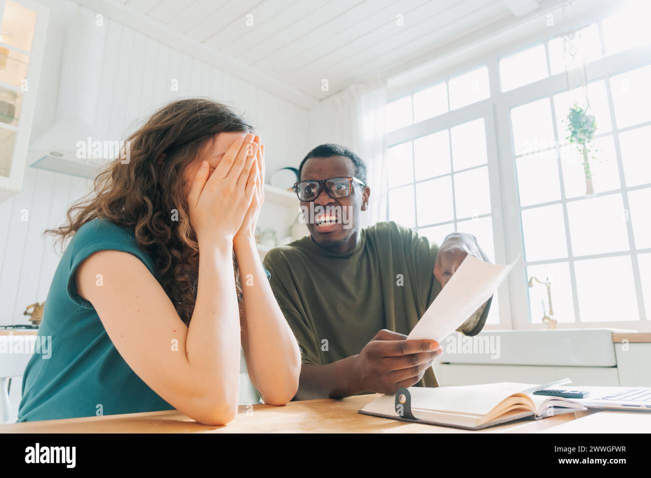A man is outraged by an expensive check after his wife's purchases. A ...