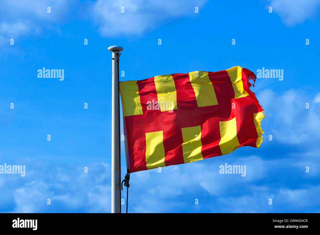 isolated Northumberland flag blowing in the wind Newbiggin by Sea ...