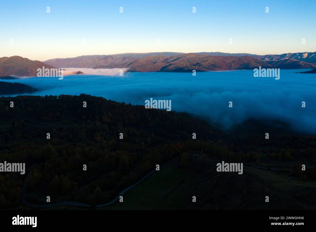 Flying above foggy valley hi-res stock photography and images - Alamy