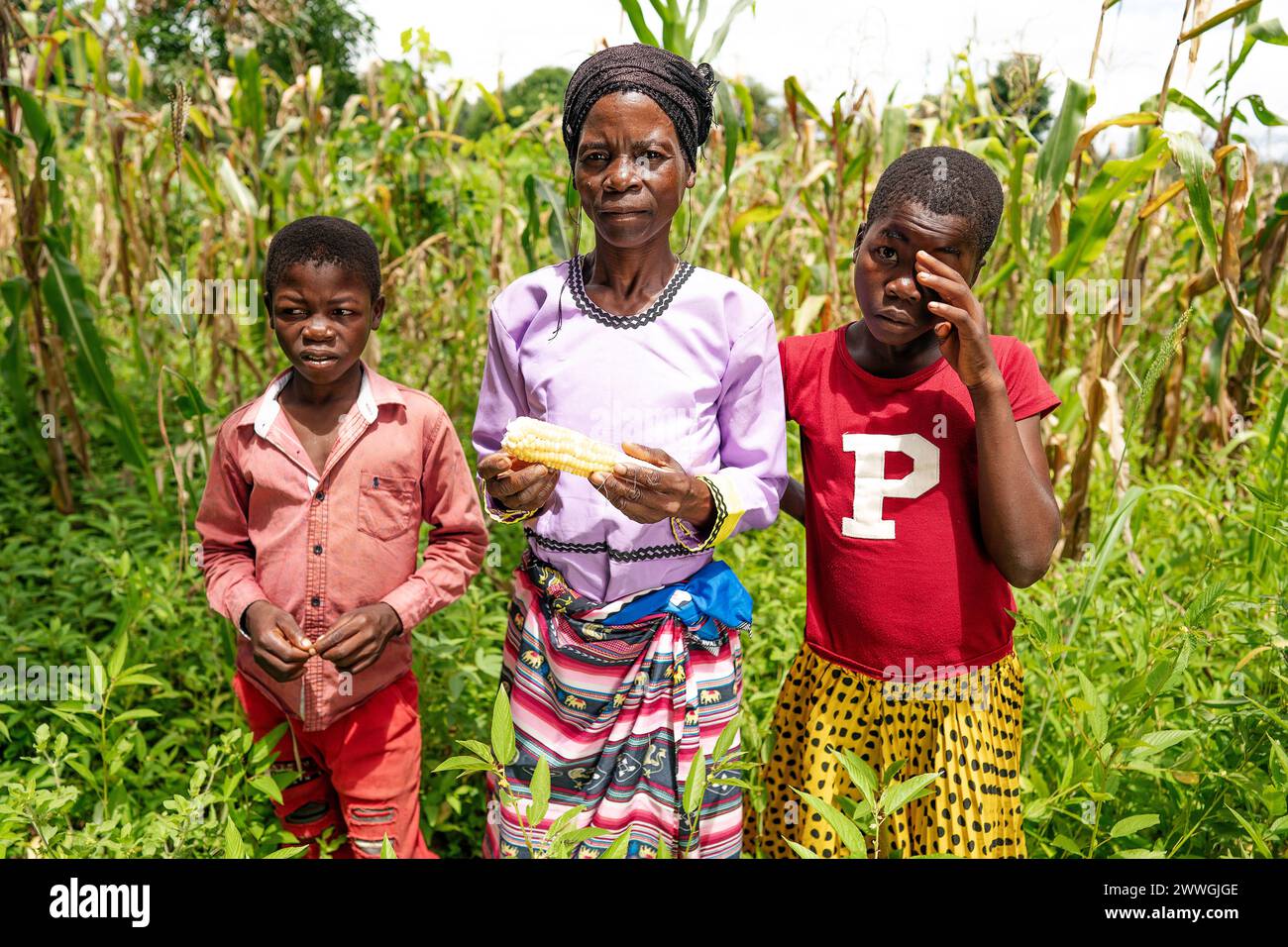 Malita Mussa and her thirteen-year-old twins Patrick (left) and ...
