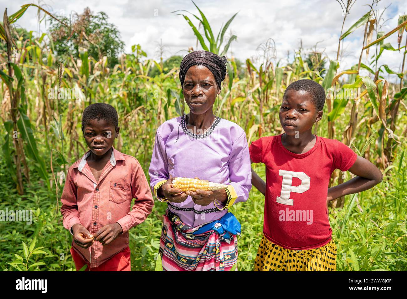 Malita Mussa and her thirteen-year-old twins Patrick (left) and ...