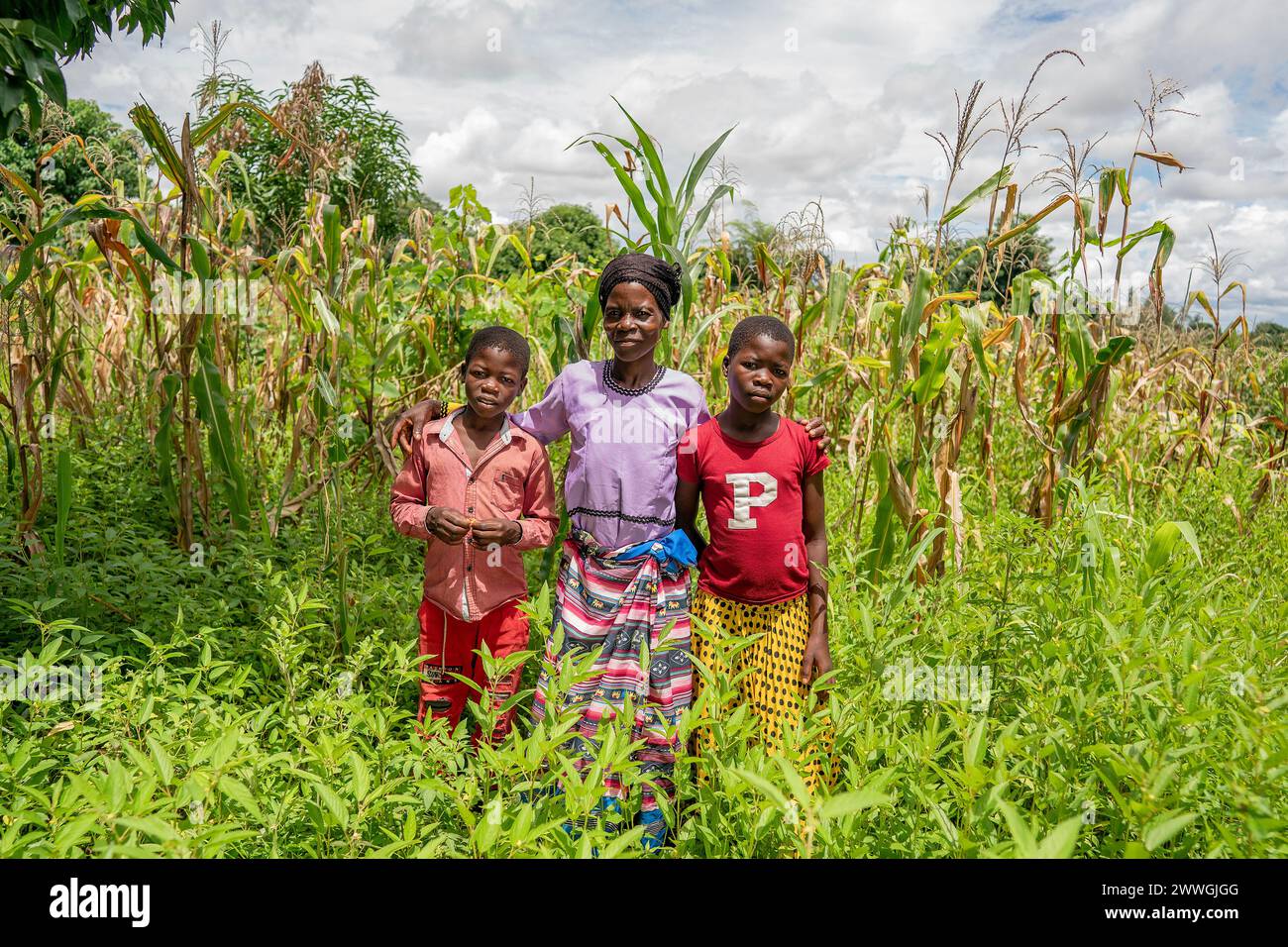 Malita Mussa and her thirteen-year-old twins Patrick (left) and ...