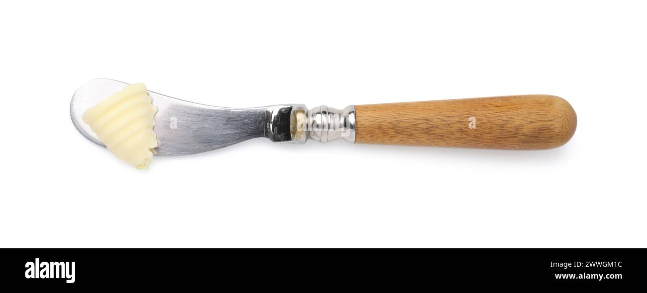 Butter curl and knife isolated on white, top view Stock Photo - Alamy