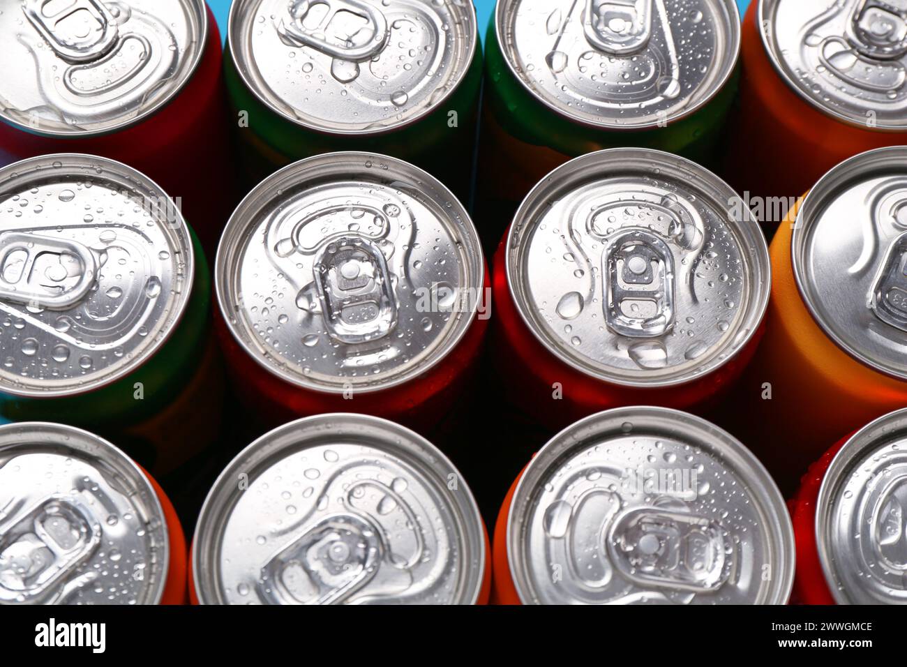 Energy drinks in wet cans, above view. Functional beverage Stock Photo ...