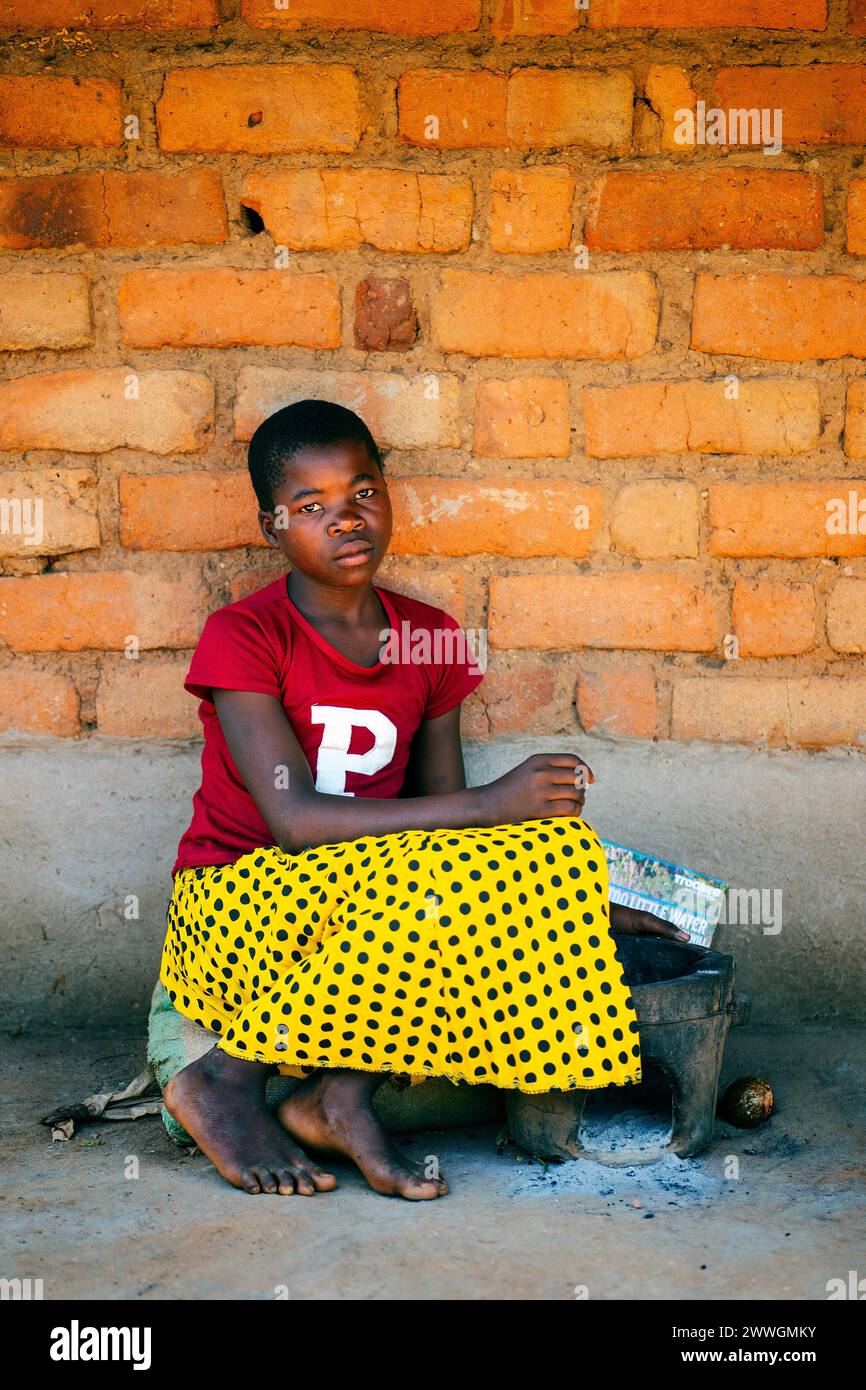 Patricia Mussa (13), who along with her mother Malita and twin brother ...