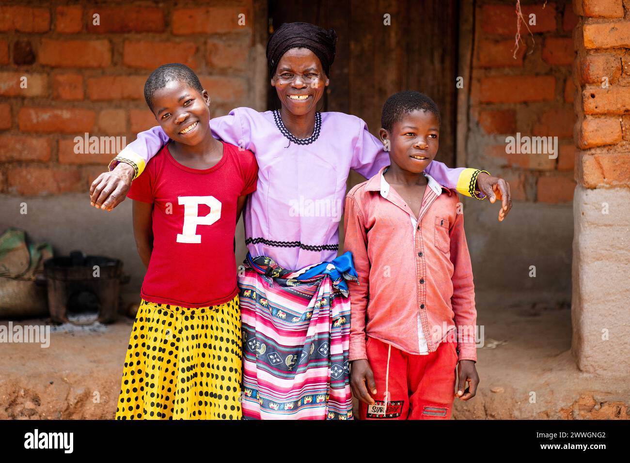 Malita Mussa and her thirteen-year-old twins Patrick (right) and ...