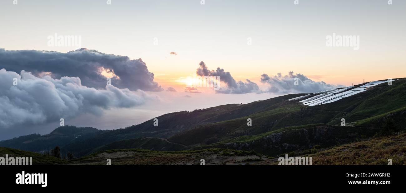 Solar panels in Madeira highlands at sunset Stock Photo - Alamy