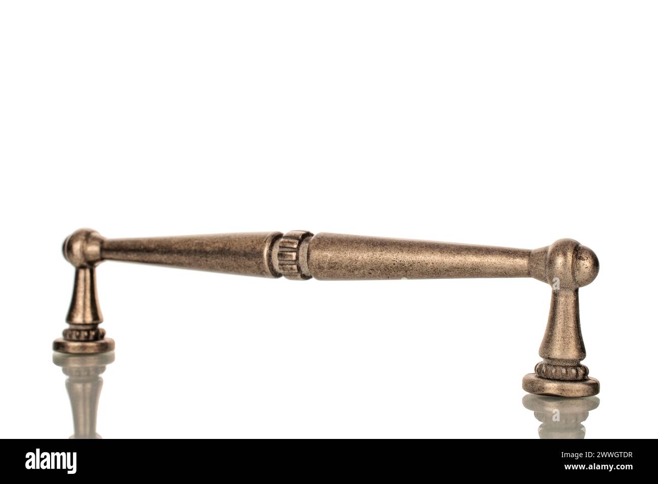 One metal furniture handle, macro, isolated on white background Stock ...