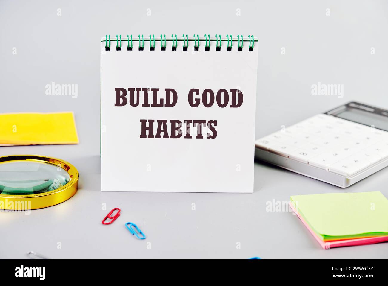 BUILD GOOD HABITS motivational concept text on a white notepad on a ...