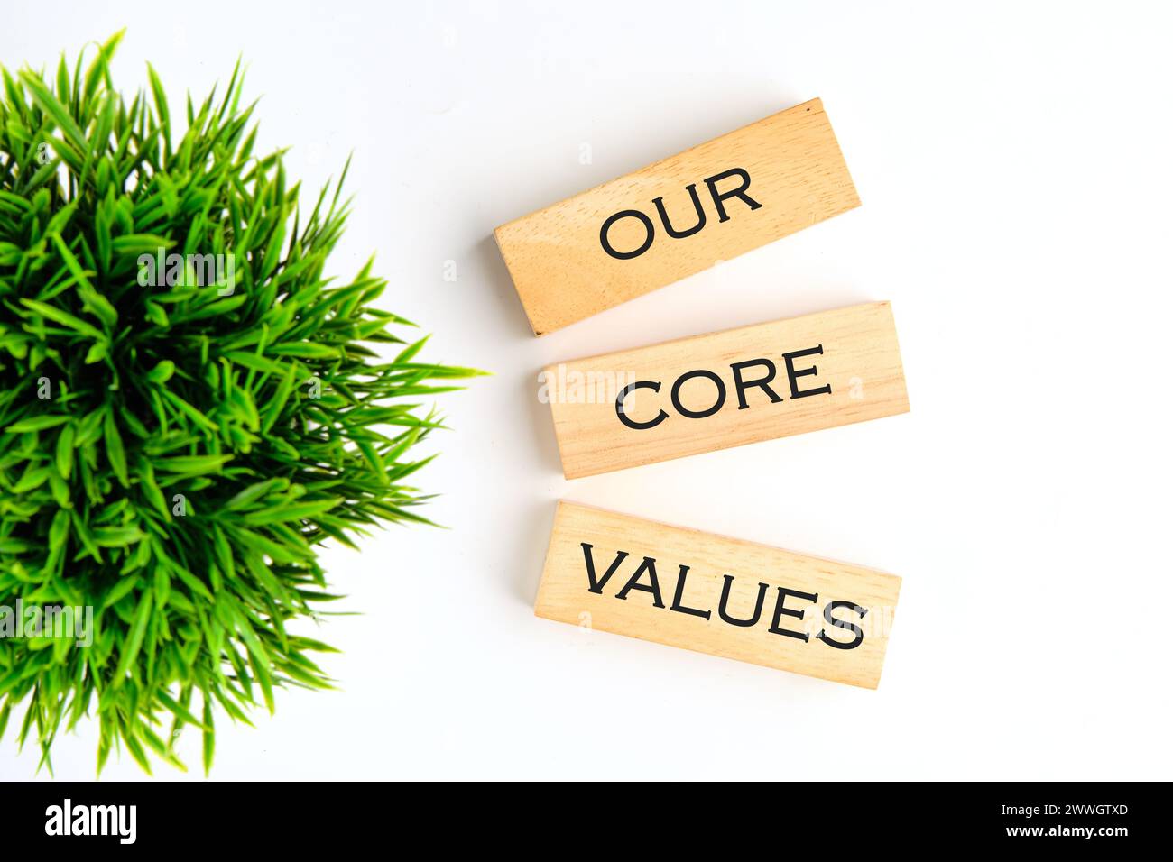 Concept words OUR CORE VALUES symbol on wooden blocks on a white ...