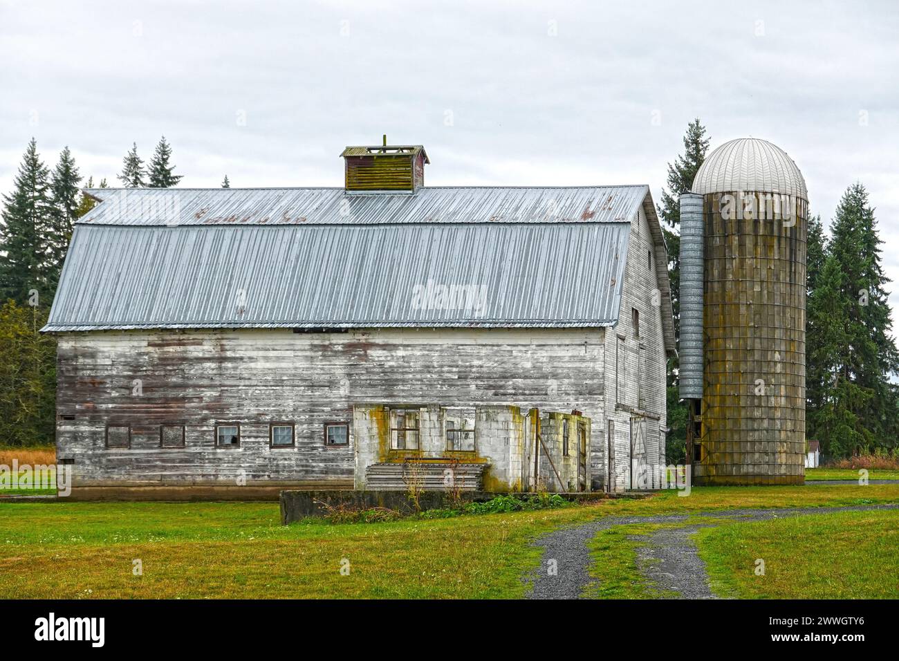 Old wooden barn and storage silo, USA Stock Photo - Alamy