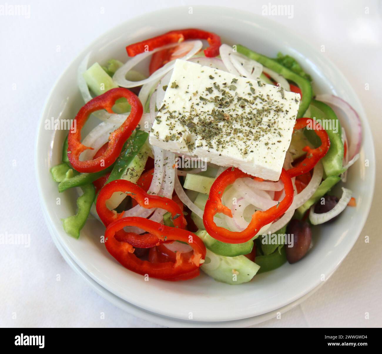 Greek Salad with Peppers, Cucumber, Feta Cheese and Herbs at Local ...