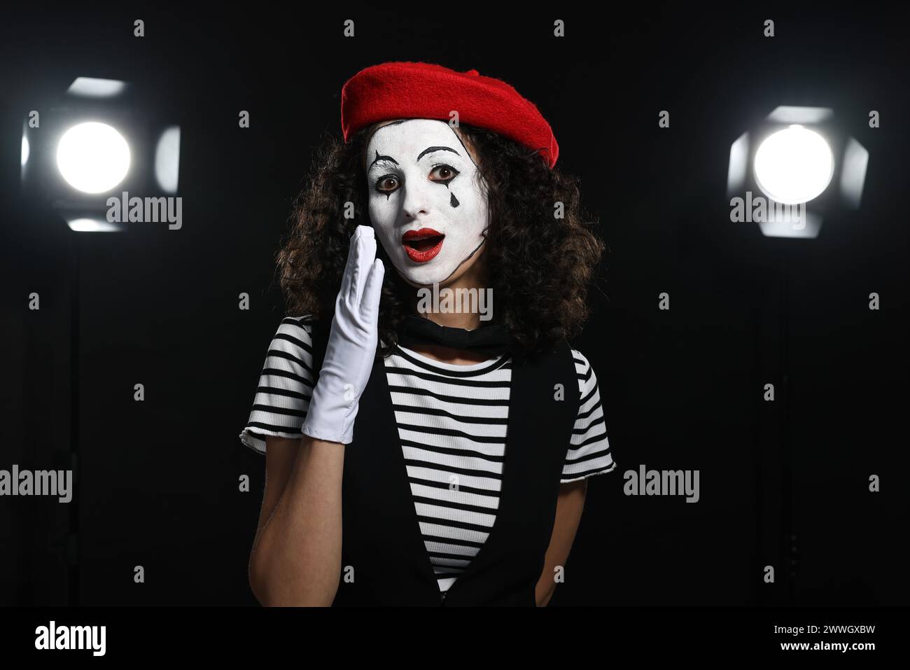 Young woman in mime costume performing on stage Stock Photo - Alamy
