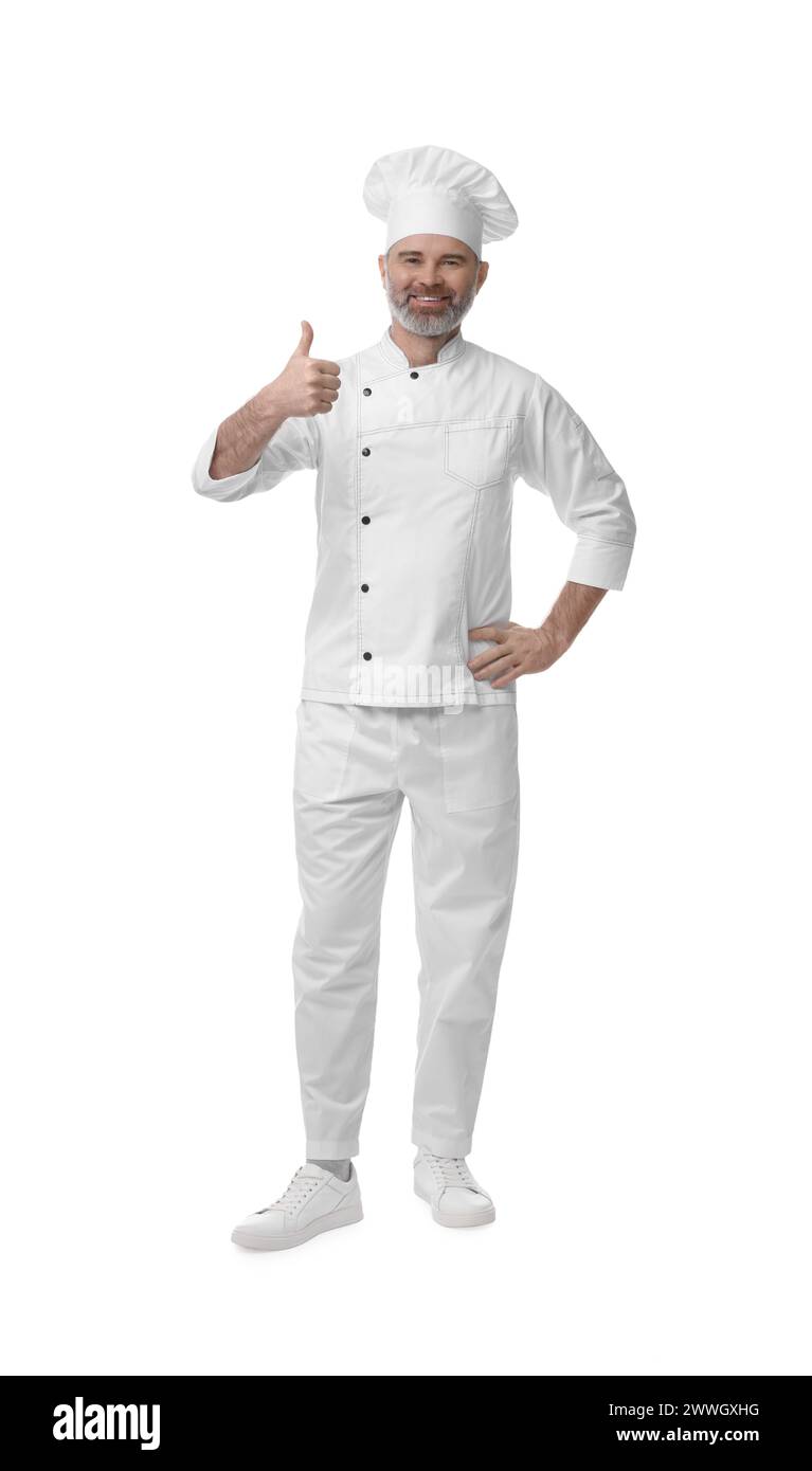 Happy chef in uniform showing thumbs up on white background Stock Photo ...