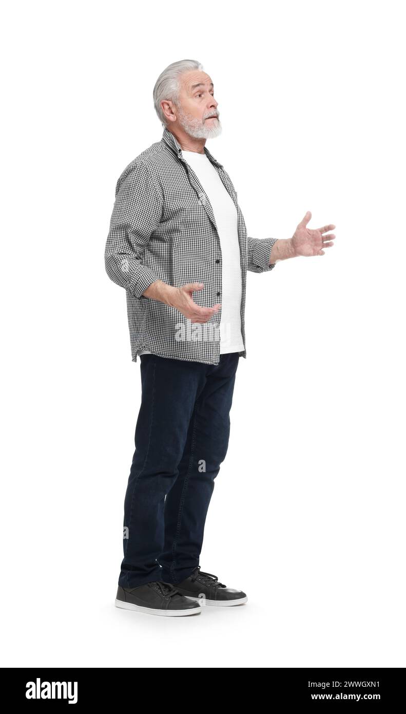 Senior man greeting someone on white background Stock Photo - Alamy