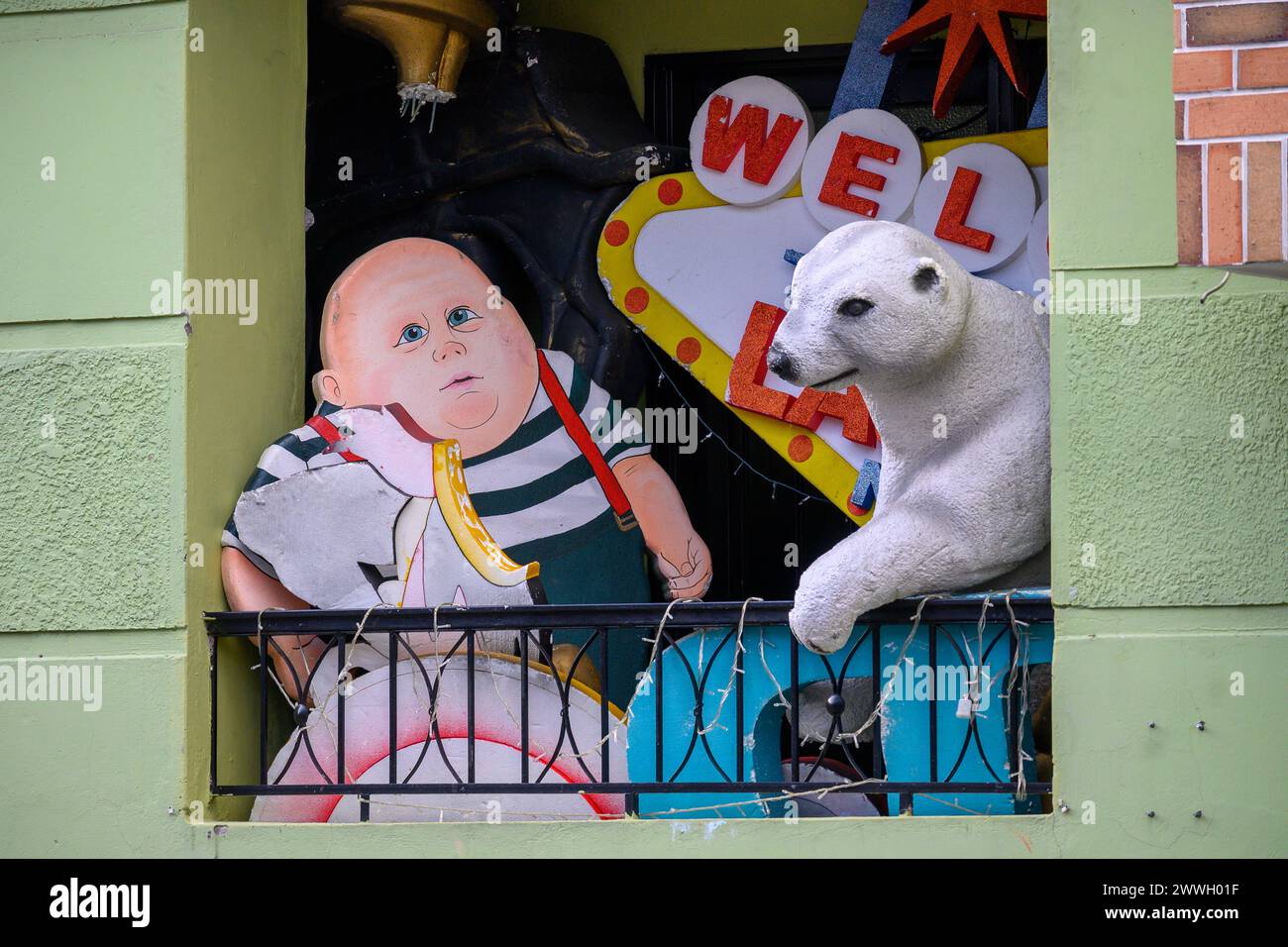 An eclectic mix of objects create a quirky and inviting window display ...