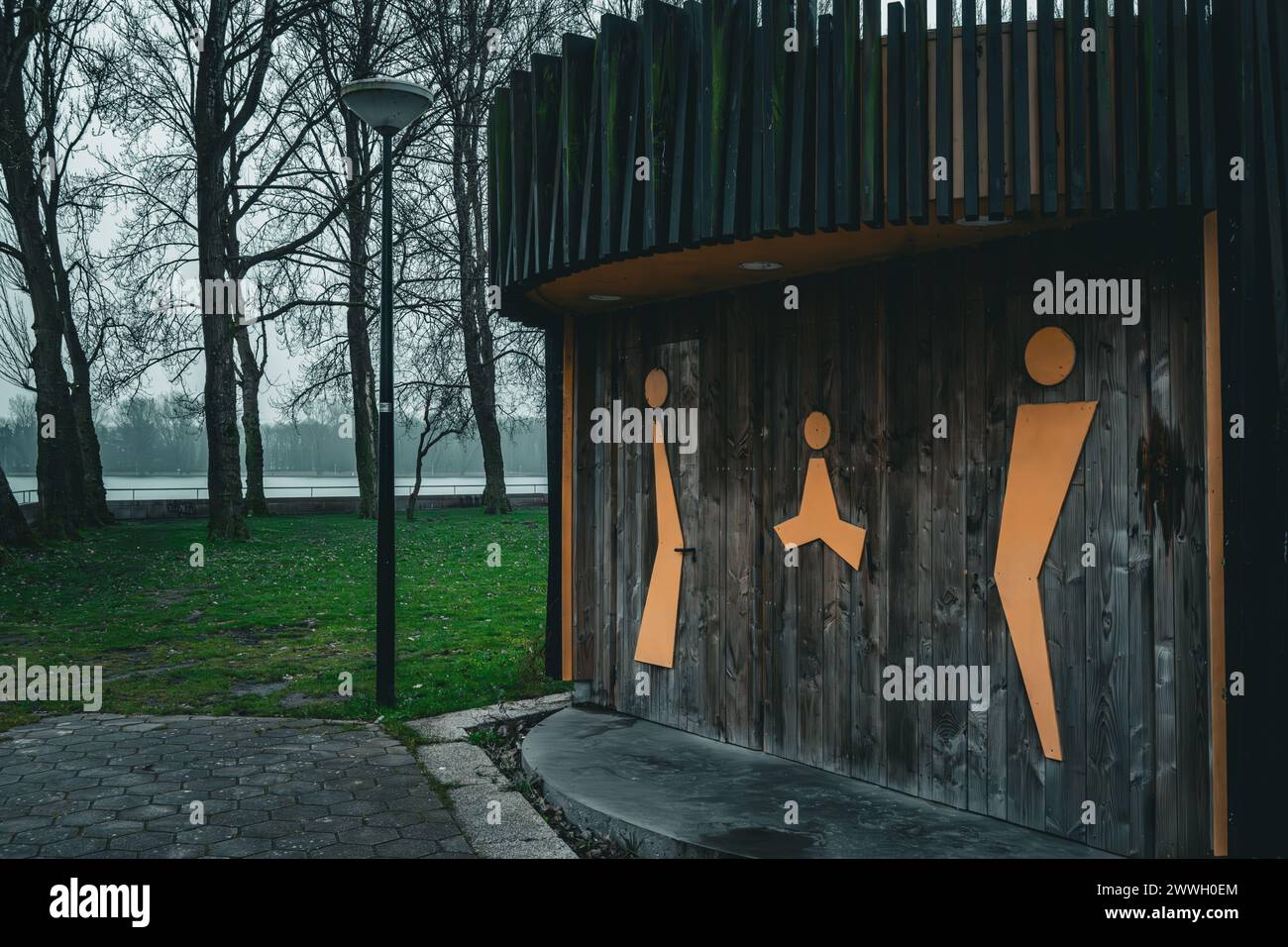 A creatively designed public restroom signage with a minimalistic and ...