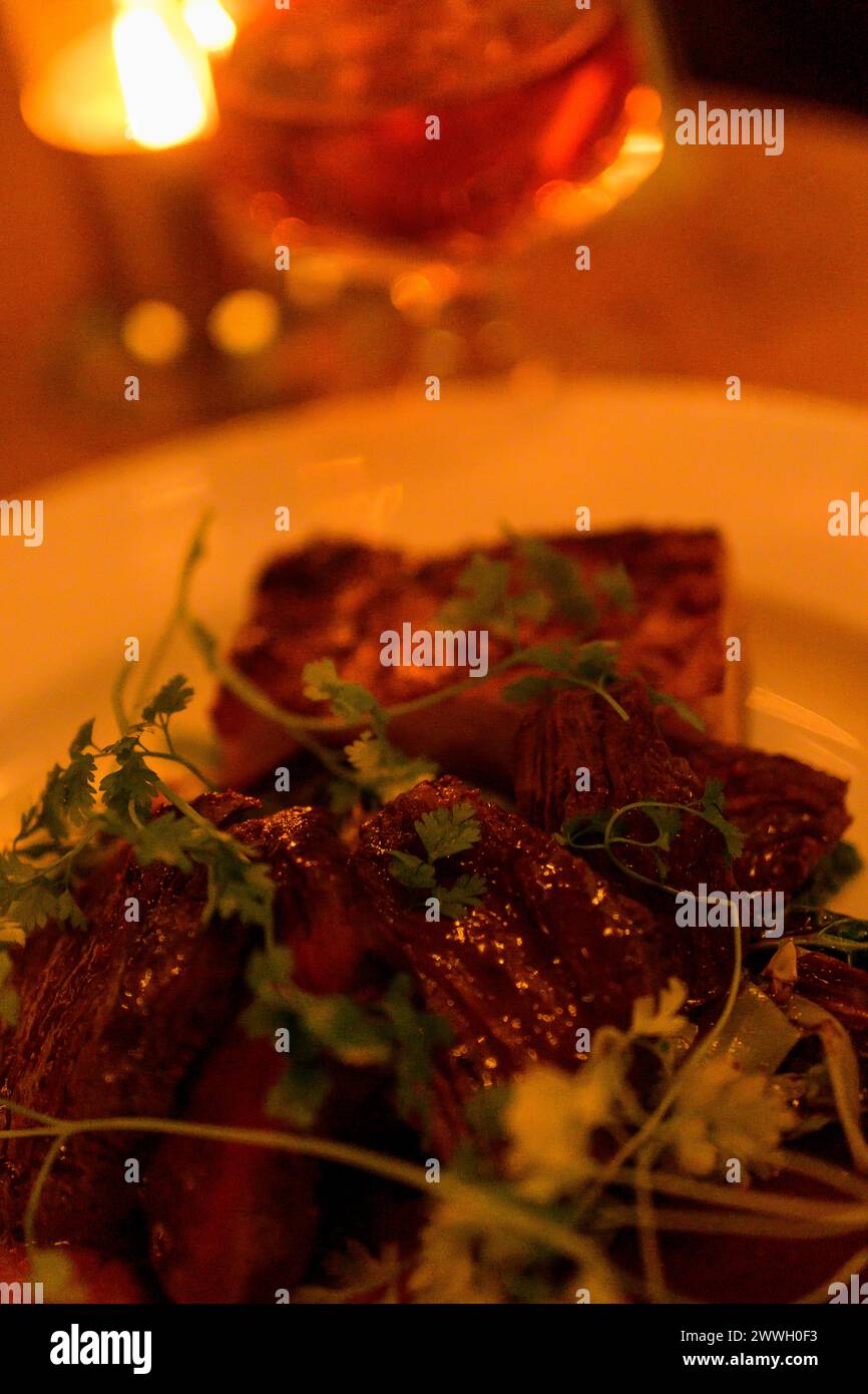 A gourmet dish served in an inviting ambiance, teasing the palate with ...