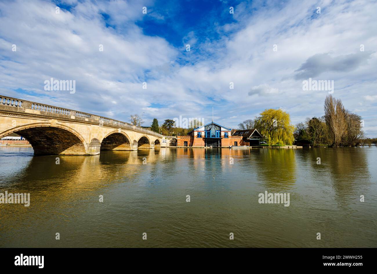 View of Henley Royal Regatta Headquarters and Grade I listed Henley Bridge over the River Thames ...