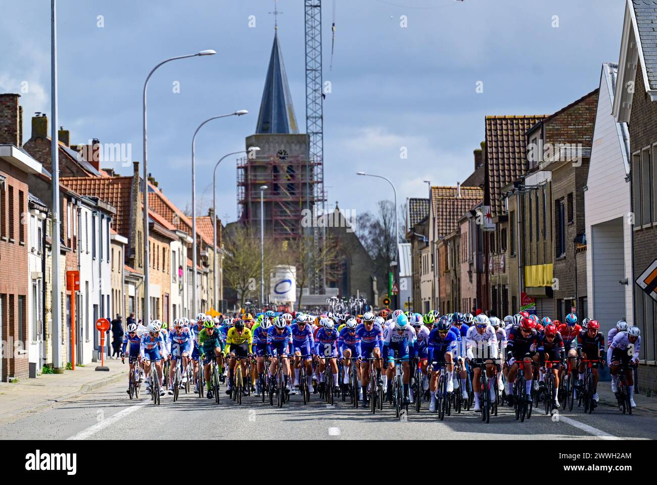 Wevelgem, Belgium. 24th Mar, 2024. The pack of riders pictured in ...
