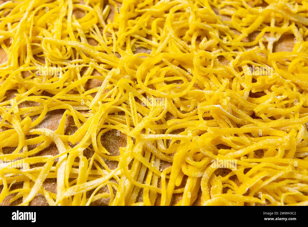 homemade pasta. background with homemade noodles. top view Stock Photo ...