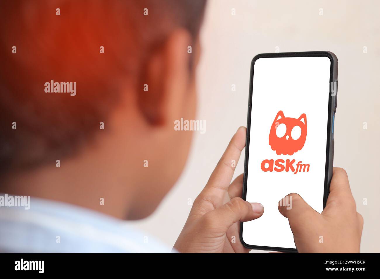 a boy opening logo Ask.fm is an app for social Q end A that lets you ...