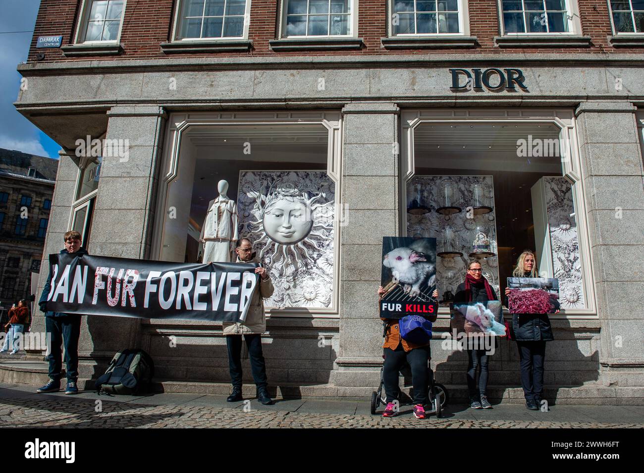 Amsterdam, Netherlands. 23rd Mar, 2024. People hold a banner and signs ...