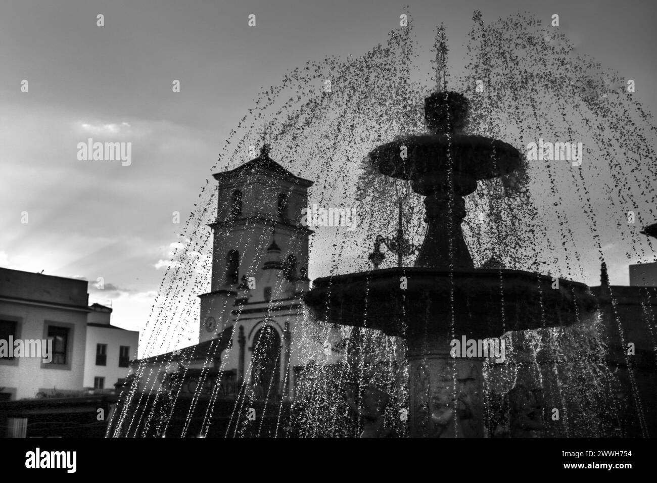 Baroque marble fountain in the main square of Merida, called Plaza de ...