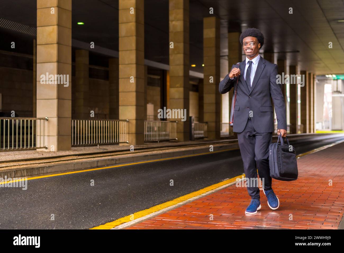 Horizontal photo with copy space of an african architect holding ...