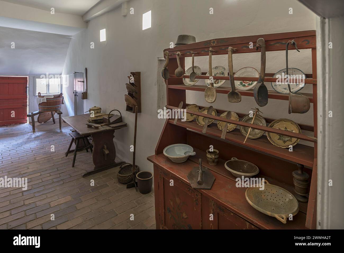 Kitchen with sideboard and laundry trough in a historic farmhouse from ...