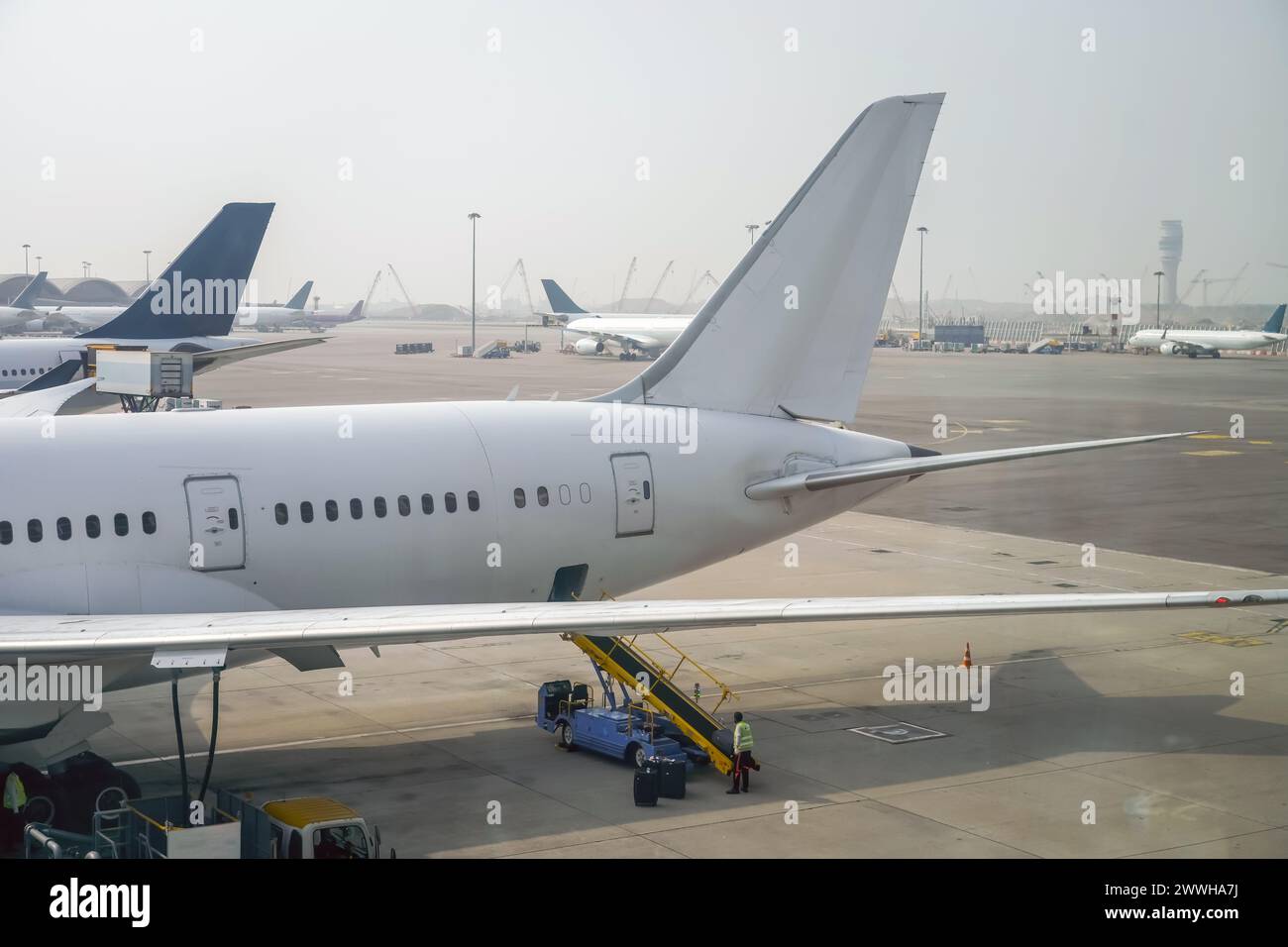 Airplane tail view at the airport Stock Photo - Alamy