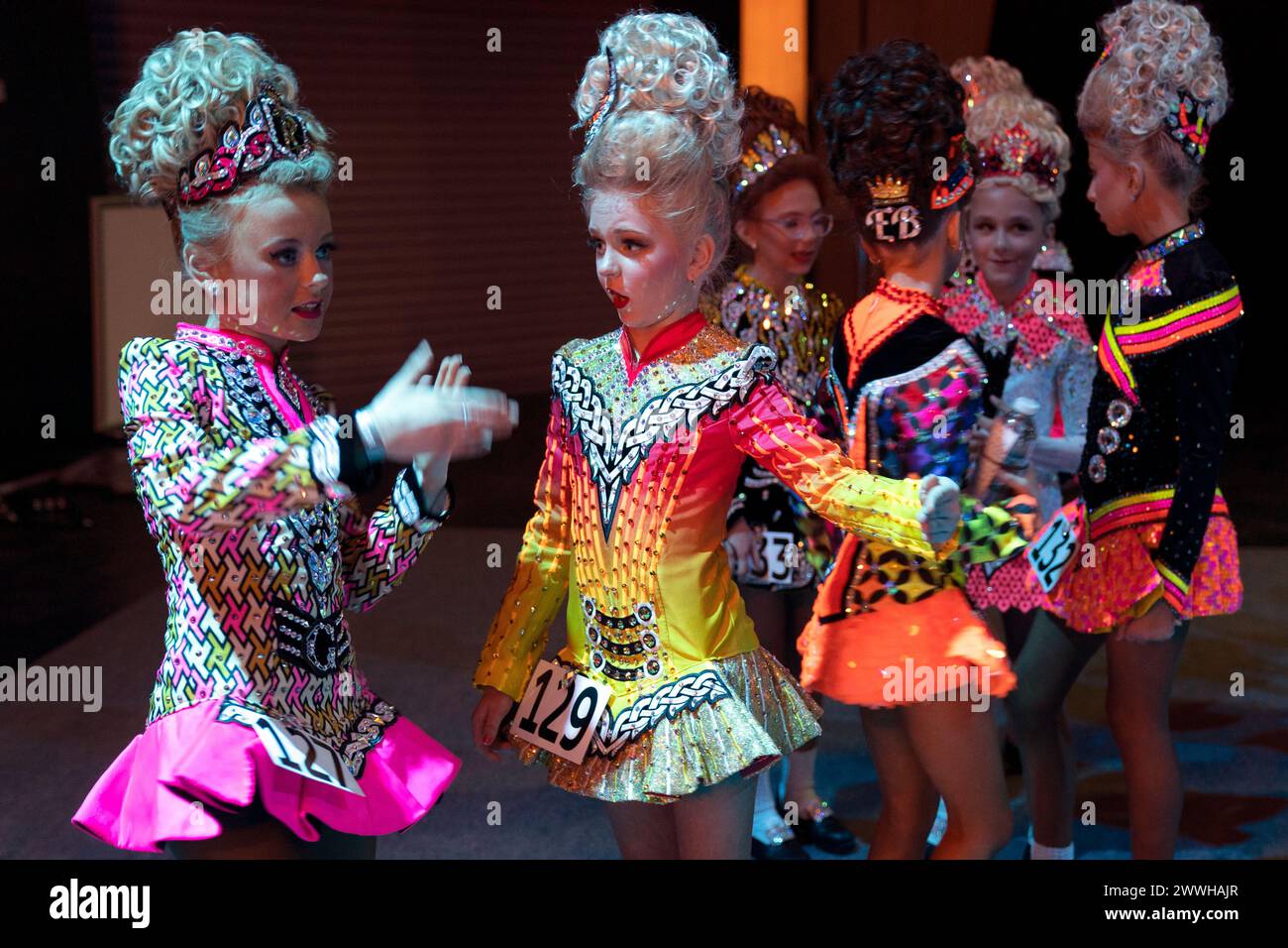 Competitors wait to perform the hornpipe backstage during the first day ...