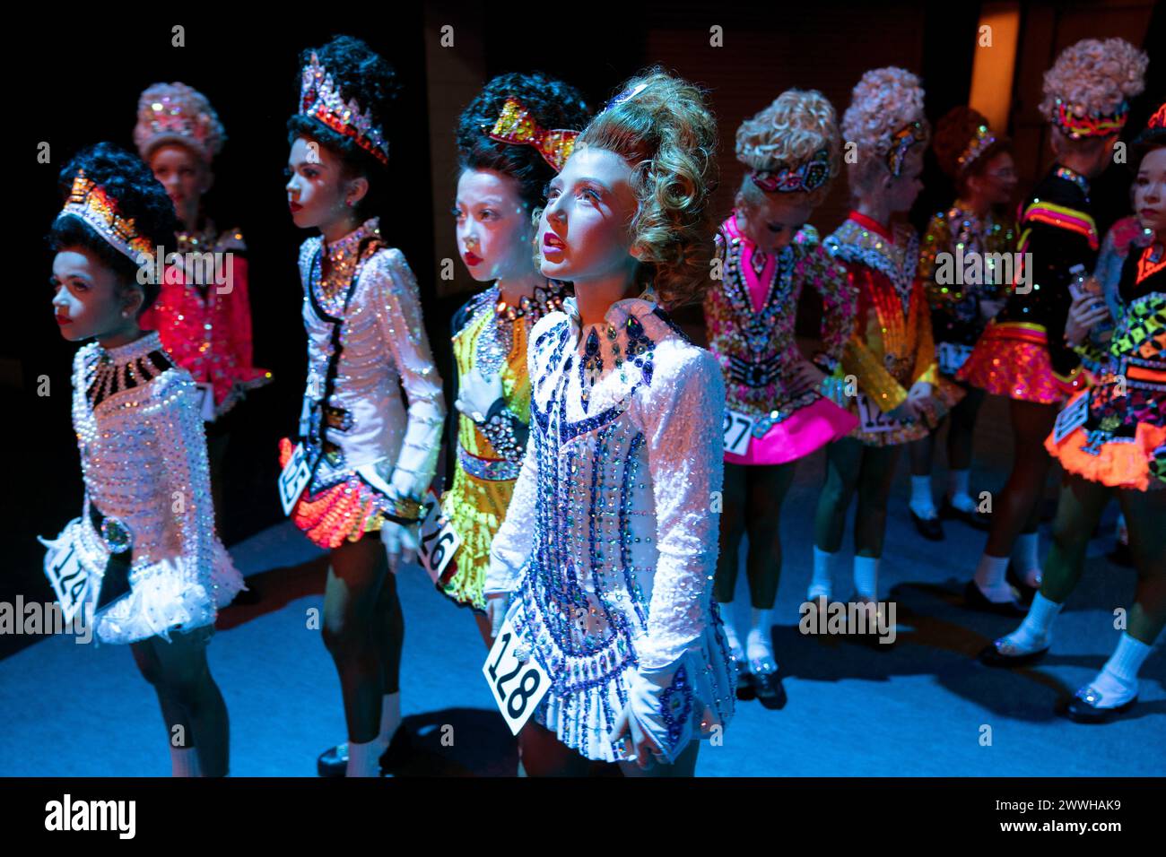 Competitors wait to perform the hornpipe backstage during the first day ...
