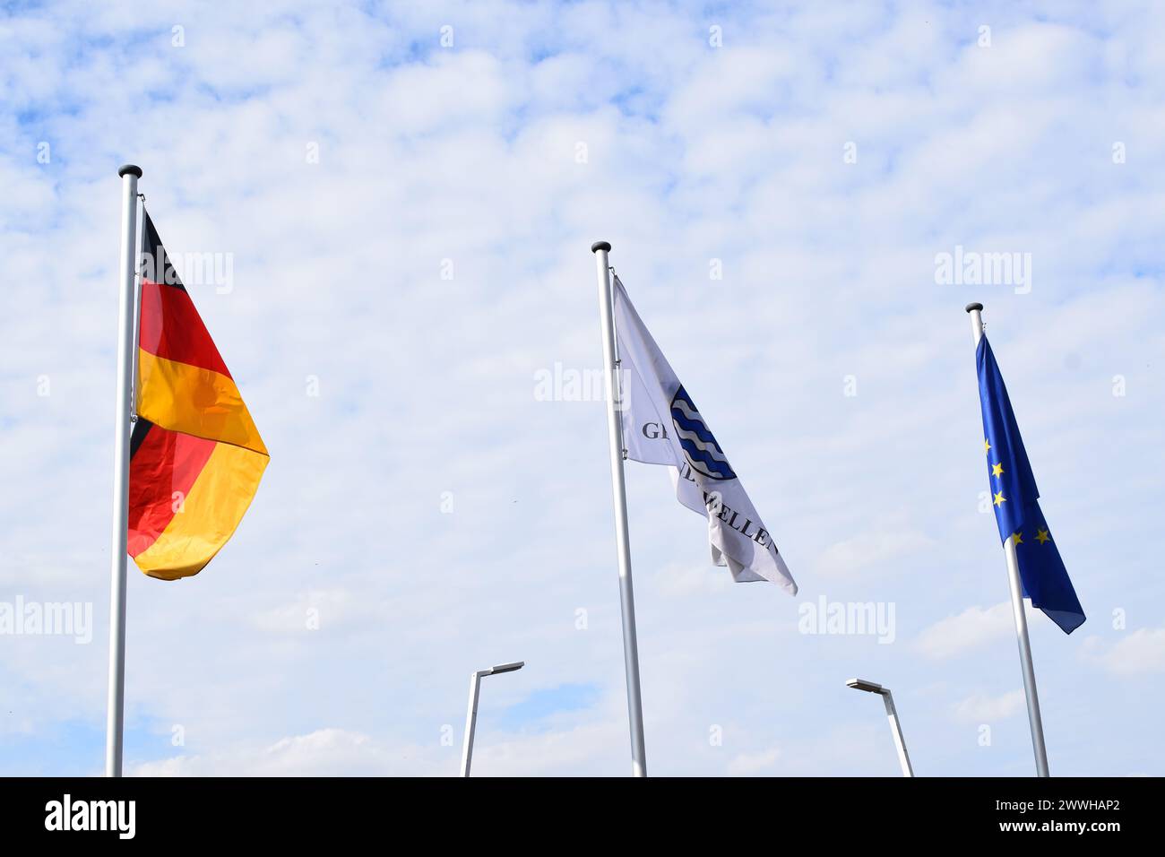 flags of Germany, the EU and town Wellen Stock Photo - Alamy