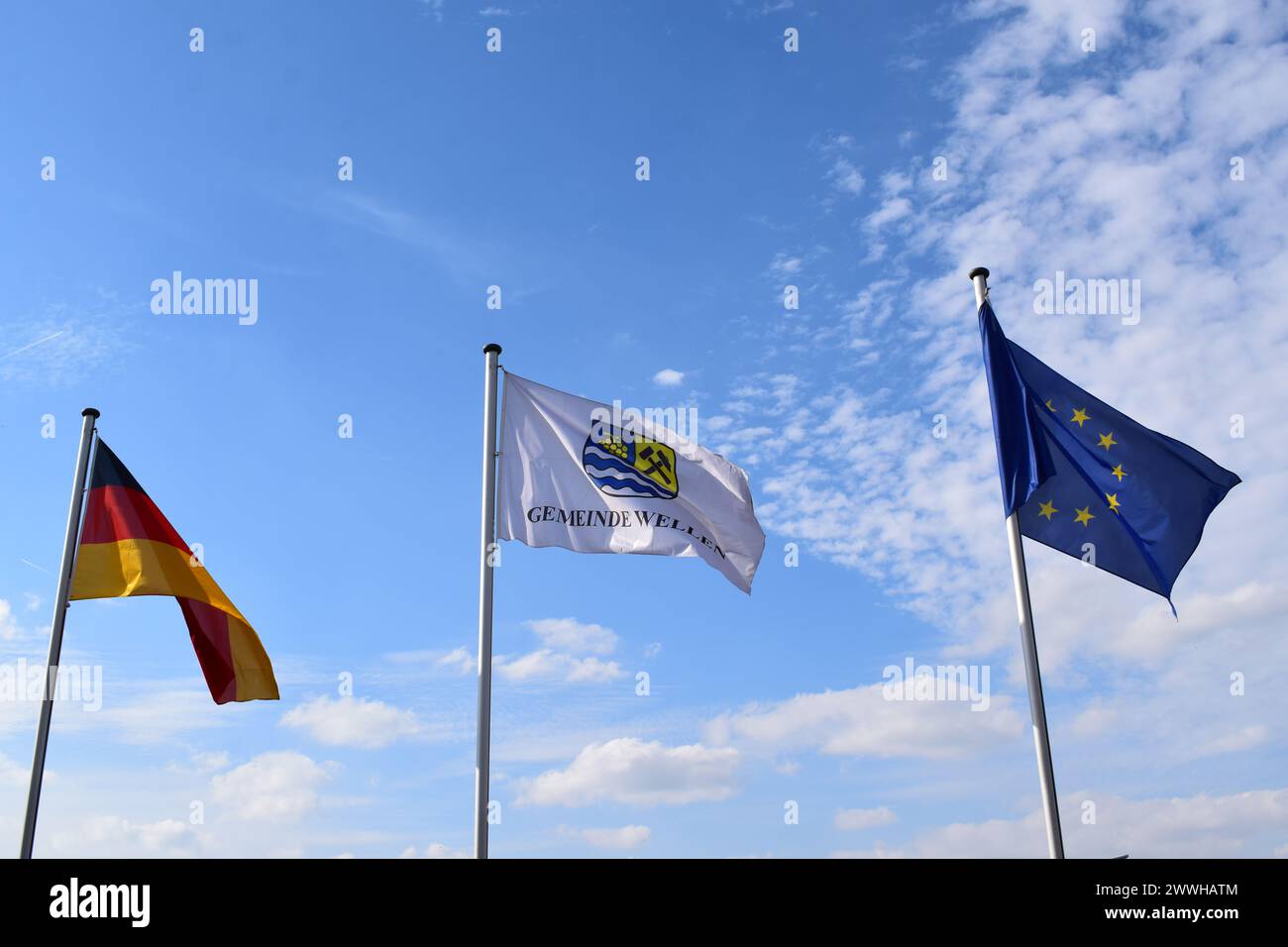 flags of Germany, the EU and town Wellen Stock Photo - Alamy