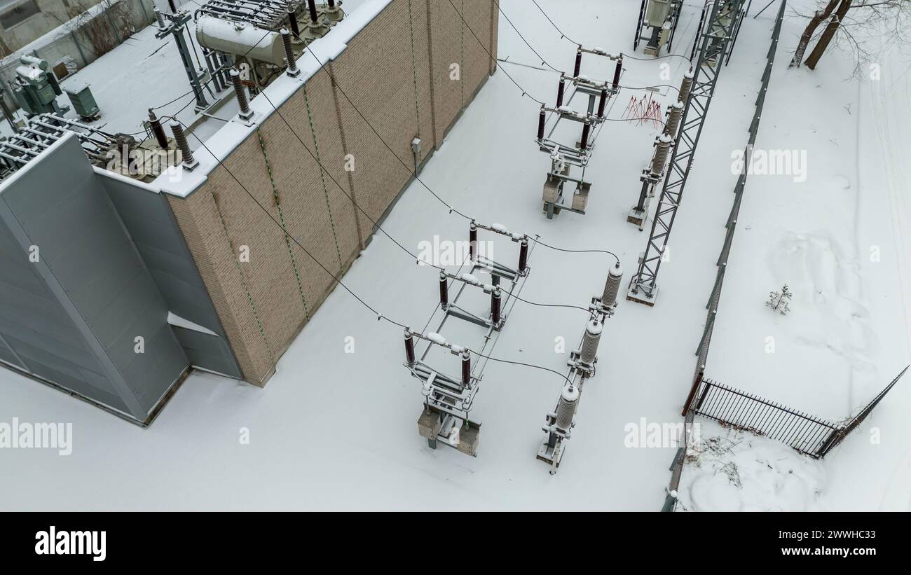 Drone photography of electrical sub station covered by snow during ...