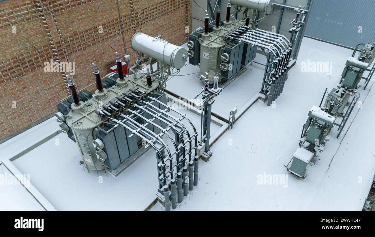 Drone photography of electrical sub station covered by snow during ...