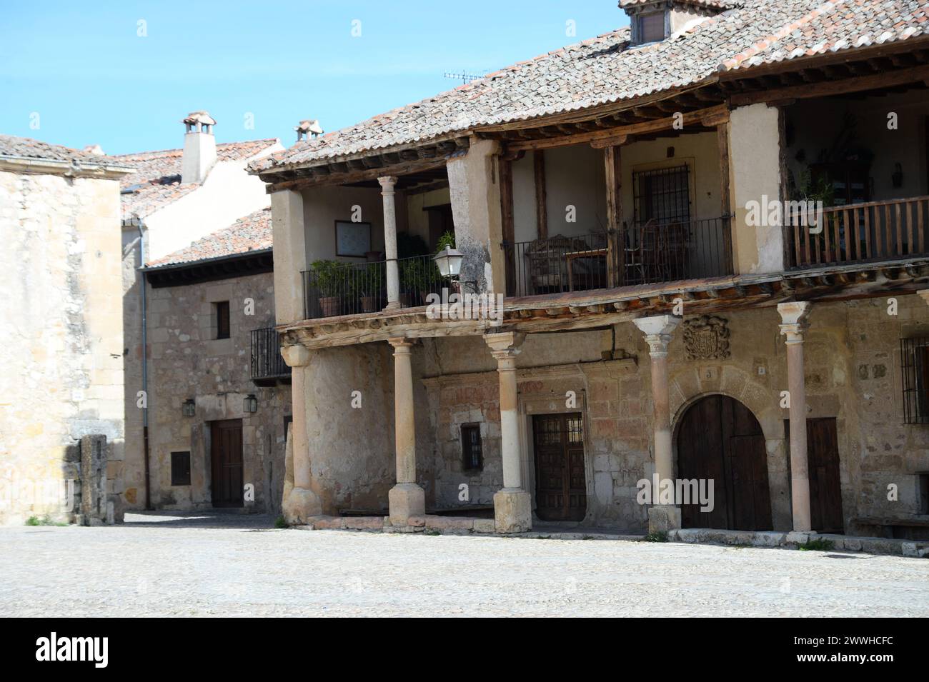 Old buildings in the square of the historic town of Pedraza, Spain ...