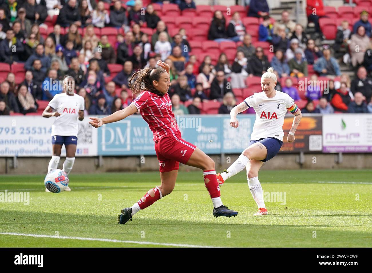 Tottenham Hotspur's Bethany England (right) scores the opening goal of ...