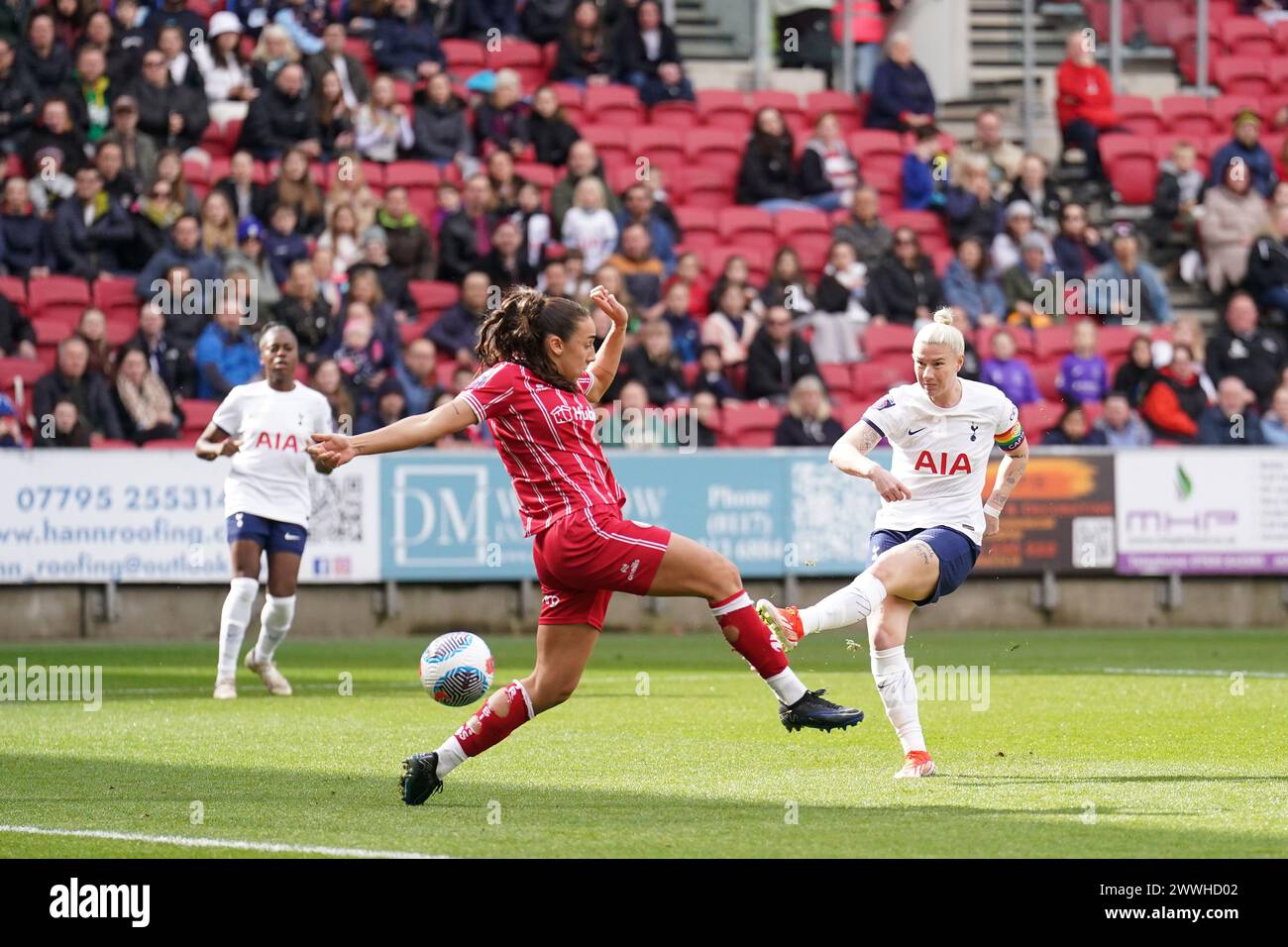 Tottenham Hotspur's Bethany England (right) scores the opening goal of ...