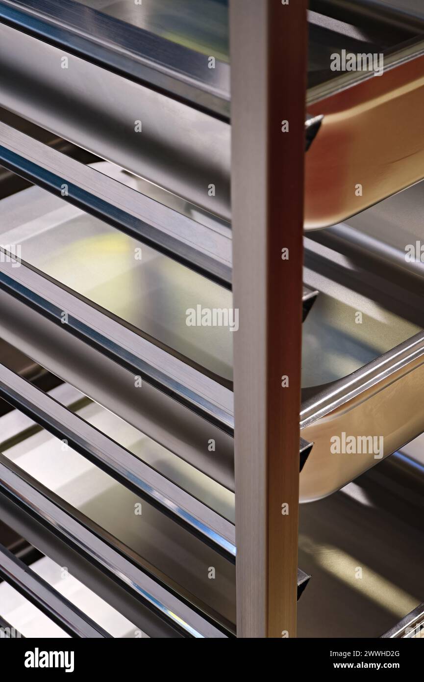 Industrial stainless steel kitchen rack, clean and empty shelves Stock ...