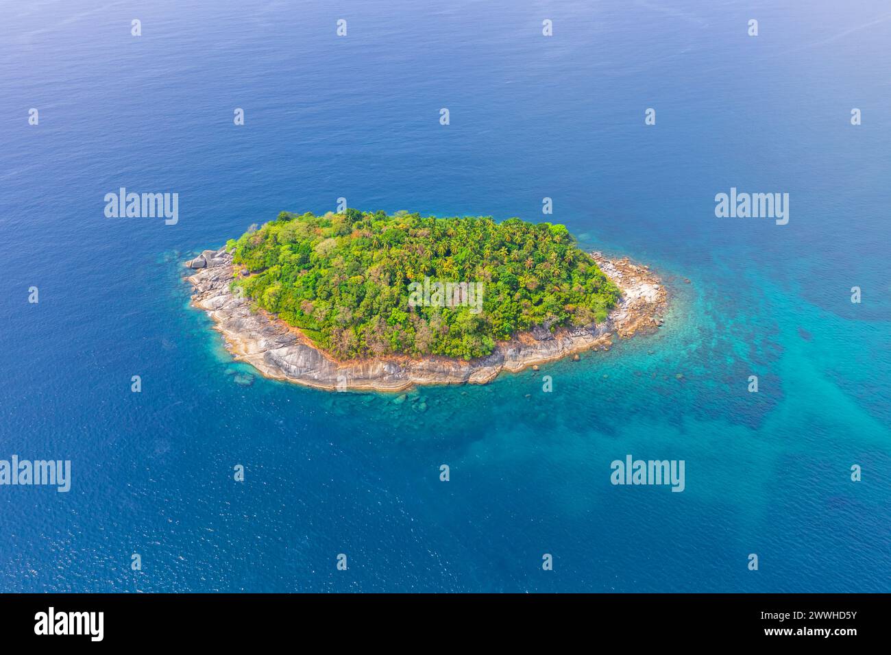 Tropical island small uninhabited washed by the crystal water of the ...