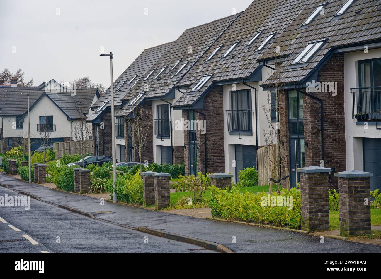 New homes in a row at recently completed housing development Stock ...