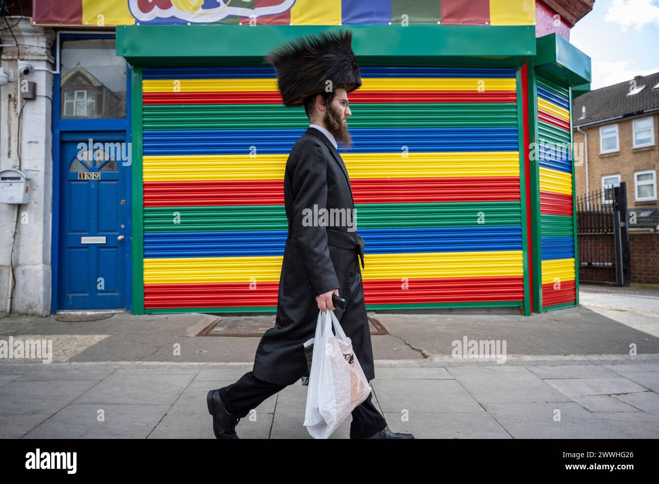 London, UK. 24 March 2024. A member of the Haredi Jewish community in ...