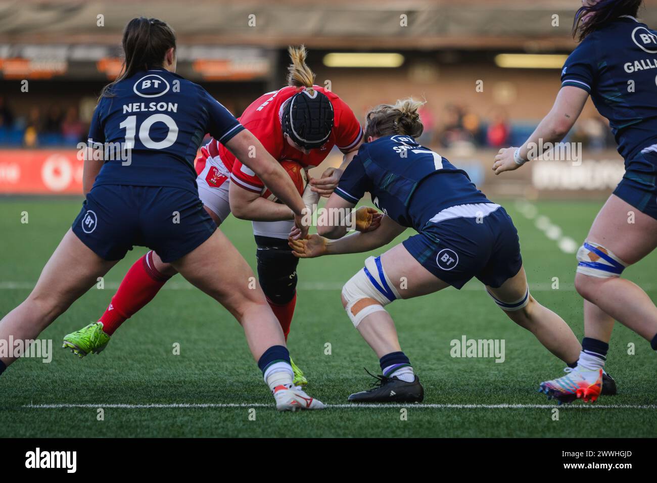Cardiff, Wales. 23rd March 2024. Helen Nelson and Alex Stewart tackle ...