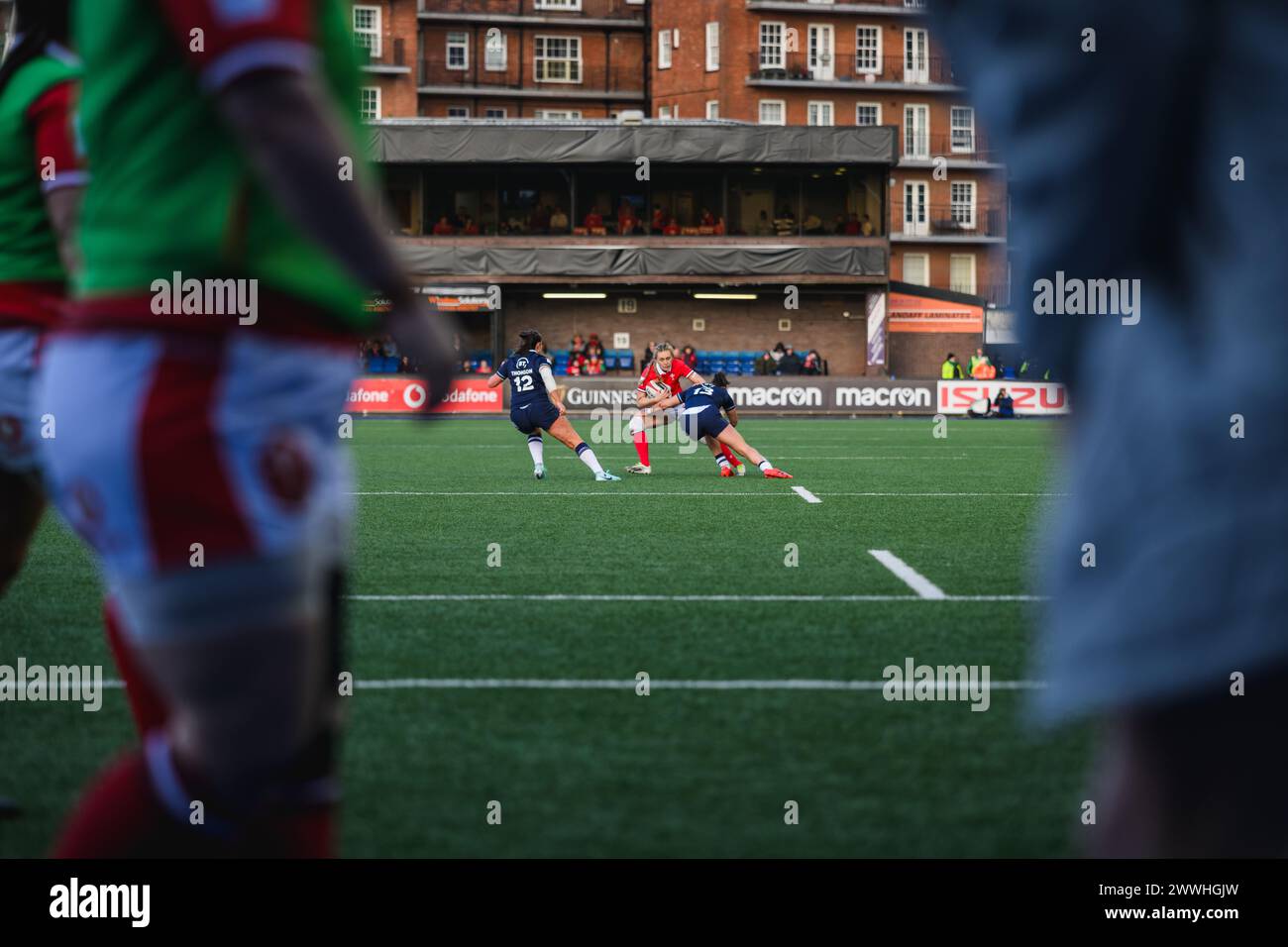 Cardiff, Wales. 23rd March 2024. Emma Orr tackles Hannah Jones during ...